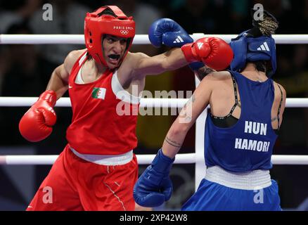 Algeria's Imane Khelif (left) and Hungary's Luca Anna Hamori during the ...