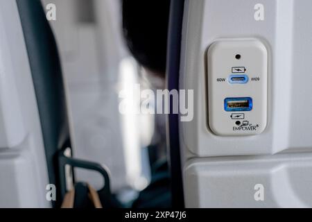 USB port at the seat of airplane for charging the electronics devices ...