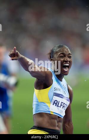Julien Alfred (LCA) competing in the Women's 100m Final, wins the gold ...