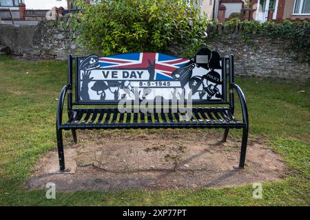 Metal bench commemorating VE Day, Hanham, Bristol, UK Stock Photo - Alamy