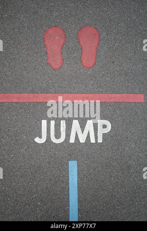 Blue painted footprints on the tarmac in a park play area Stock Photo ...