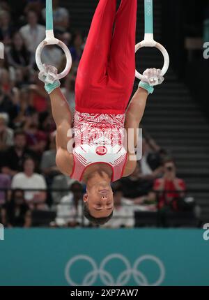 Adem Asil, of Turkey, performs on the rings during the men's artistic ...