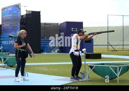 Great Britain's Amber Rutter (left) on the podium with the silver medal ...