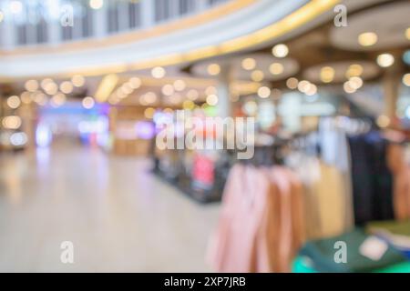 Abstract blur clothing boutique store display interior of shopping mall ...