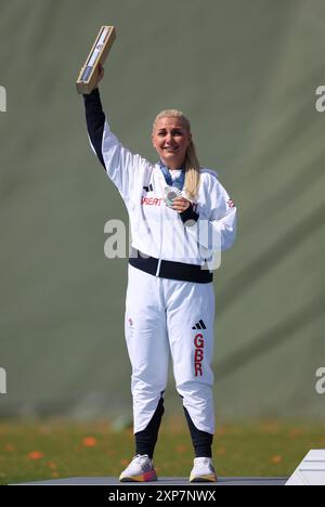 Great Britain's Amber Rutter with the silver medal after finishing ...