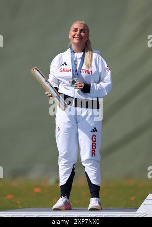 Great Britain's Amber Rutter with the silver medal after finishing ...