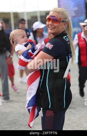 Great Britain's Amber Rutter with son Tommy and her silver medal from ...