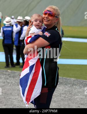Great Britain's Amber Rutter with son Tommy and her silver medal from ...