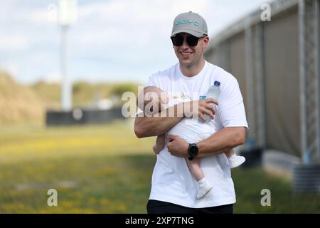 Great Britain’s Amber Rutter with her son Tommy and husband James after ...