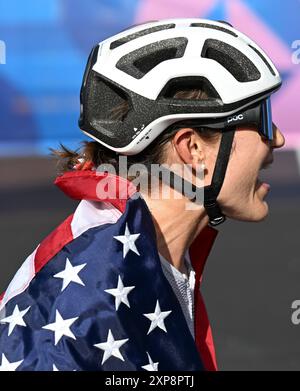 Kristen Faulkner, of the United States, celebrates winning the women's ...