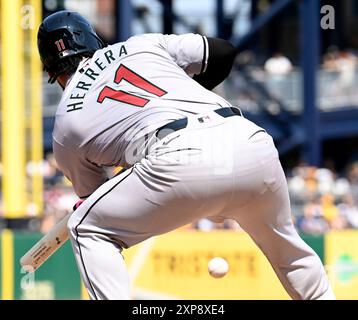 Arizona Diamondbacks catcher Jose Herrera (11) and pitcher A.J. Puk ...