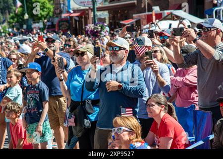 The 4th of July parade runs down main street in the mountain town of ...