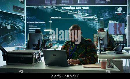 Army intelligence expert utilizes modern computer systems and satellite ...