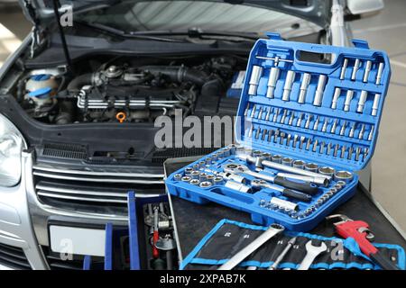 Set of different auto mechanic's tools at automobile repair shop ...