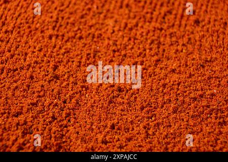 Ground paprika, red terracotta spice background, art in cooking Stock ...