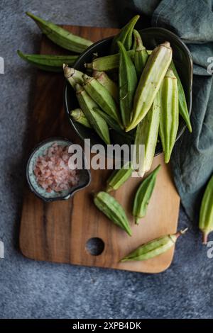 Raw bamia or okra vegetable cooking Stock Photo - Alamy