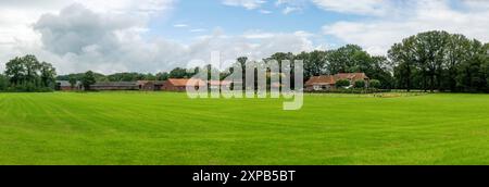 Green meadows and countryhouses at the Dutch border around Neuenhaus ...