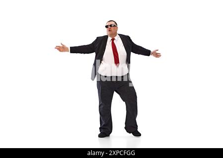 Taking dynamic break. Overweight man in black suit, white shirt and ...
