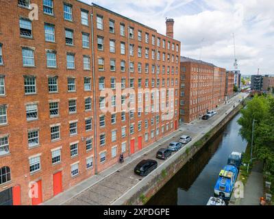 Red brick, old cotton mills buildings next to Rochdale canal in Ancoats ...