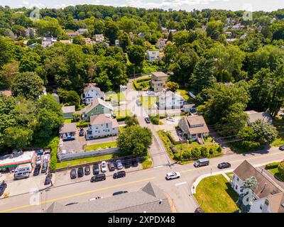 Homes and businesses by the Hawthorne train station New York, USA 2024 ...