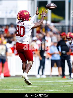 Washington Commanders wide receiver Jamison Crowder (left) and wide ...