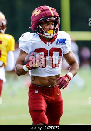 Washington Commanders running back Austin Ekeler (30) looks on before ...