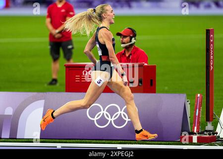 Keely Hodgkinson, of Britain, crosses the finish line to win the women ...