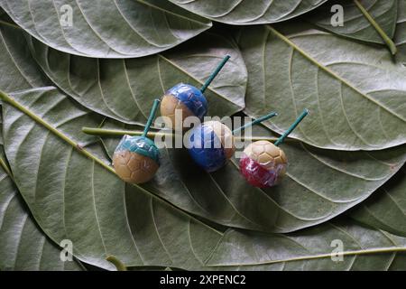 A closeup of small firecrackers on a white background Stock Photo - Alamy