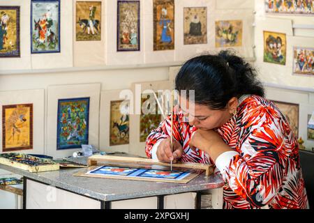Woman painting a miniature, Bukhara, Uzbekistan Stock Photo - Alamy