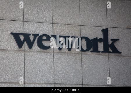 Wework logo on squarish background, Singapore Stock Photo - Alamy