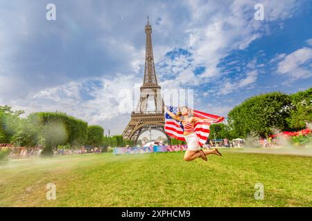 Patriotic American Woman jumping and cheering for Team USA and the ...