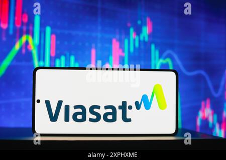 In this photo illustration, the ViaSat Inc. logo is displayed on a ...