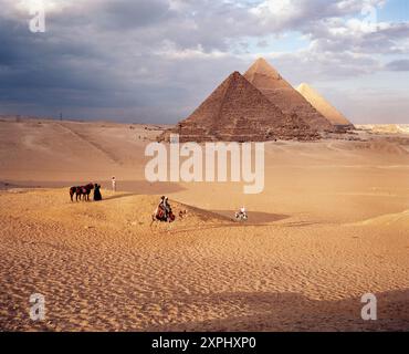 Majestic Pyramids of Giza Under a Cloudy Sky Ancient Wonders of the ...