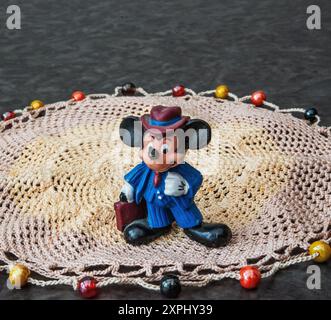 Vintage Mickey Mouse in blue suit with case Stock Photo - Alamy
