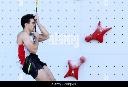 Reza Alipour Shenazandifard of Iran reacts as he competes in the men's ...