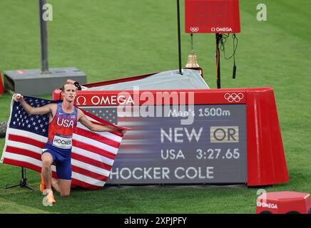 Cole Hocker of the United States poses after winning gold in the men's ...
