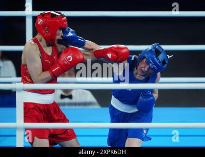 Ireland’s Kellie Harrington (right) in action against China’s Wenlu ...