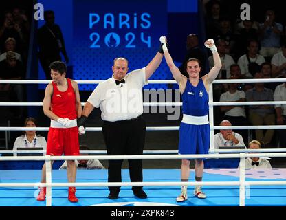 Ireland's Kellie Harrington, right, celebrates winning gold after ...