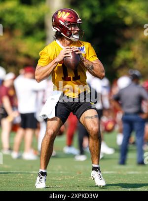 Washington Commanders quarterback Sam Hartman warms up before an NFL ...