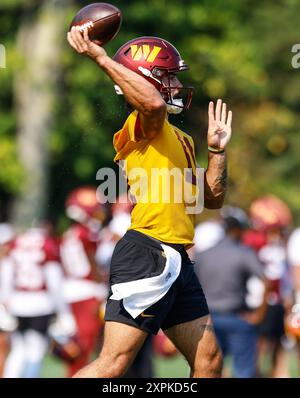 Washington Commanders quarterback Sam Hartman warms up before an NFL ...
