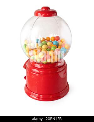 little red gumball machine with gum isolated on white background with ...