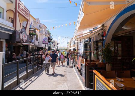 Alvor Portugal busy street in Algarve town with tourists and visitors ...
