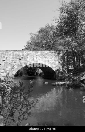 Davies Bridge, also known as Cedar Creek Bridge, spans Cedar Creek in ...