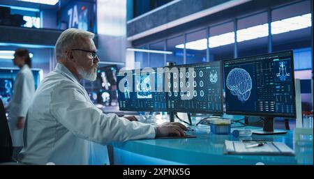 Senior Male Neuroscientist Using Desktop Computer To Analyze MRI Scans ...