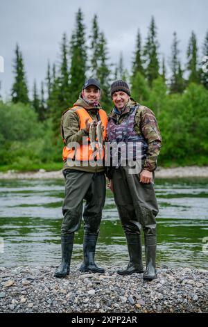 FISHERMAN SHOW OFF THEIR CATCH IN THE SALMON CAPITAL OF THE WORLD Stock ...