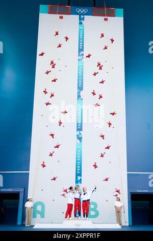 Gold medalist team China pose with their medals after the team ...