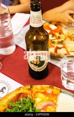 Trieste, Italy 28-7-2024 : Bottle of Moretti beer next to an Italian ...