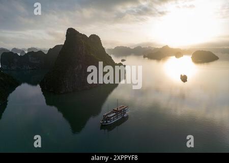 Aerial view of cruise ship Ginger (Heritage Line) in a bay surrounded ...
