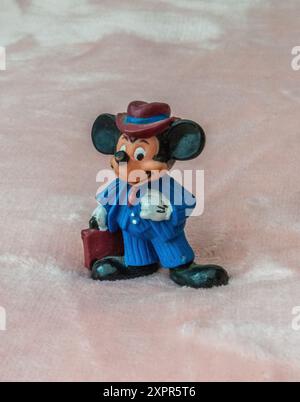 Vintage Mickey Mouse in blue suit with case Stock Photo - Alamy