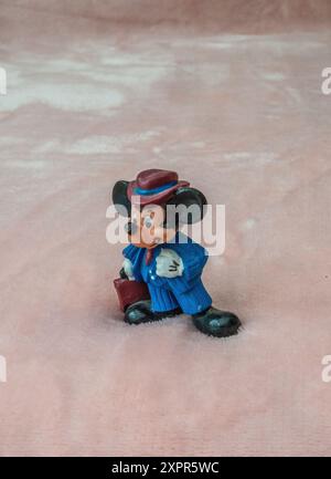 Vintage Mickey Mouse in blue suit with case Stock Photo - Alamy